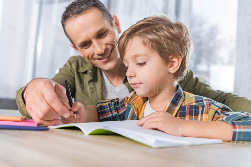 Father Helping Little Son with Homework Stock Photo - Image of father ...
