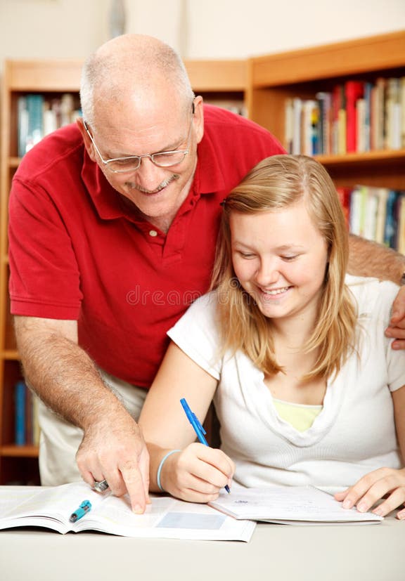 Father Helps Daughter Study Stock Photo - Image of male, library: 19470418