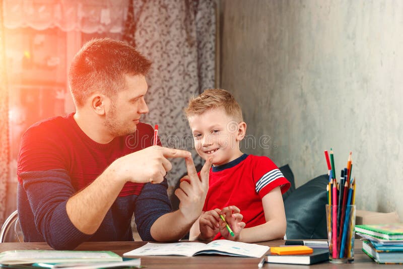 Father Helps His Son To Catch Up on the Bar Stock Image - Image of male ...