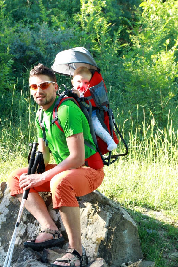 Father and His Child in the Backpack. Stock Photo - Image of hiking ...