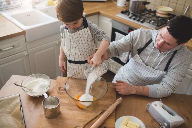 A Father and His Son Cooking Stock Image - Image of combine, cookie ...