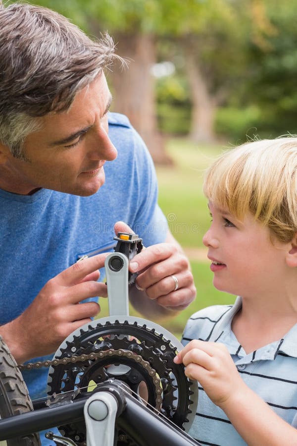 Father and His Son Fixing a Bike Stock Image - Image of lifestyle ...