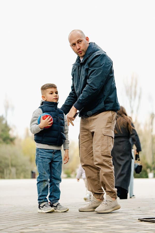 Father and His Son on a Walk in the Park Stock Photo - Image of young ...