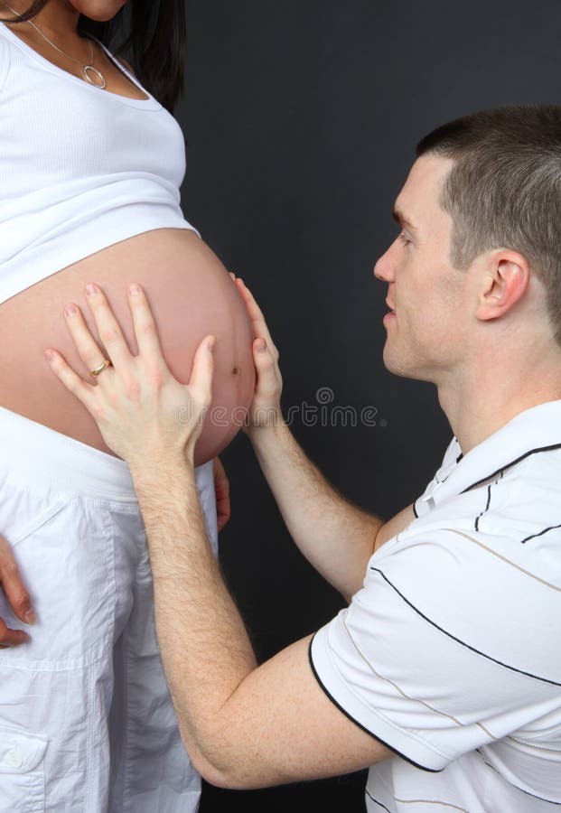 Father Holding Baby in Pregnant Mom Stock Photo - Image of adult ...
