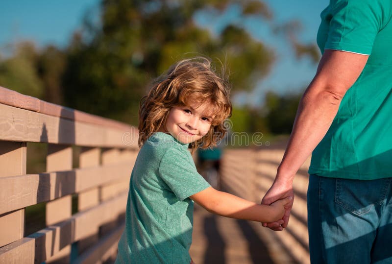 Father Holding Child Son Hand. Parenting Concept. Stock Image - Image ...