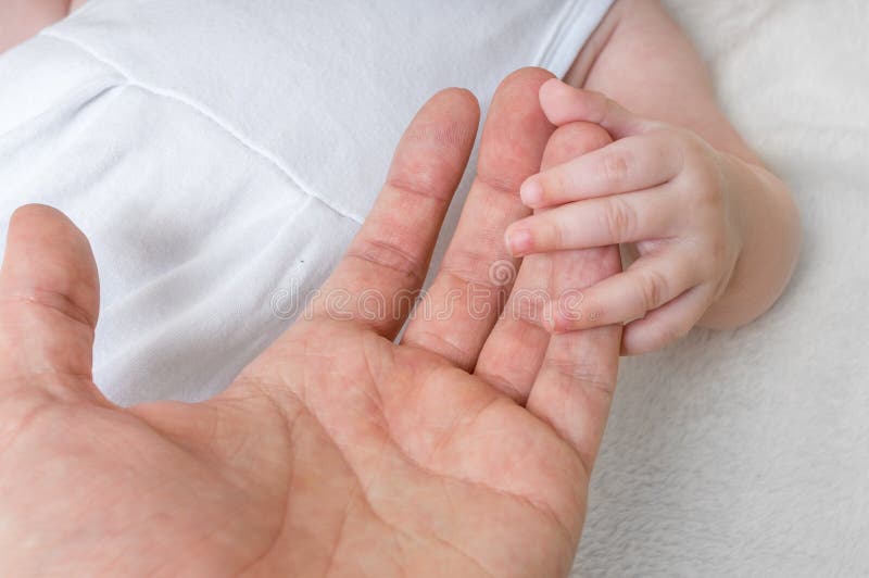 Father Holds Hand of His Baby Stock Photo - Image of amour, father ...