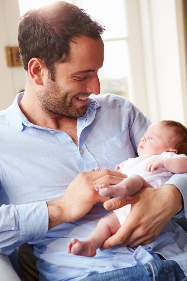 Father at Home with Newborn Baby Daughter Stock Image - Image of ...
