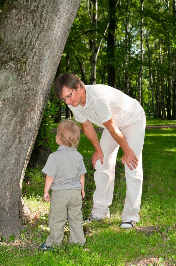 Father and Little Child in Park Stock Photo - Image of generation ...
