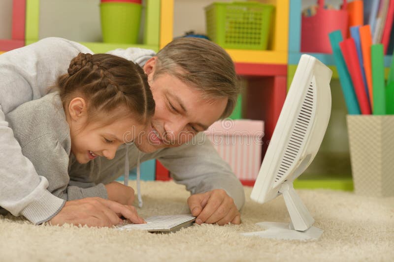 Father and Little Daughter with Computer Stock Image - Image of people ...