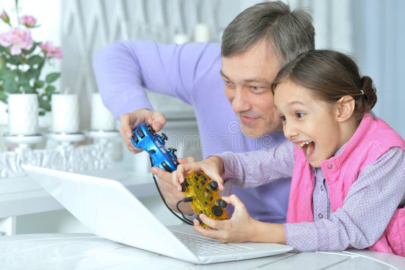 Father with Little Daughter Playing Computer Game Stock Photo - Image ... Father with Little Daughter Playing Computer Game Stock Photo - Image ...