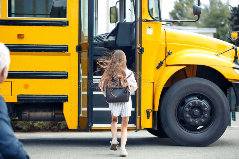 Father Looking at Daughter Going To School Bus Back View Stock Image ...