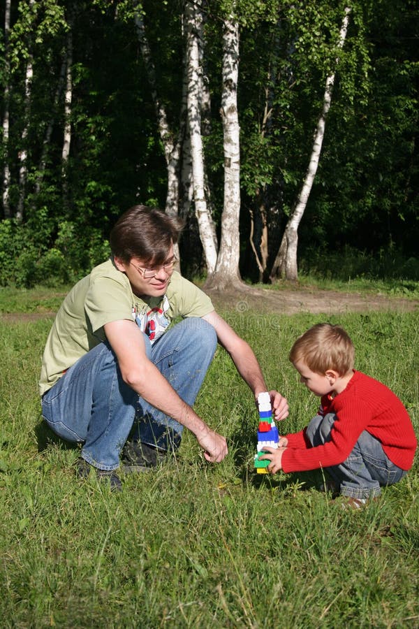 Father and Son Play in Water Stock Image - Image of time, wave: 109394529