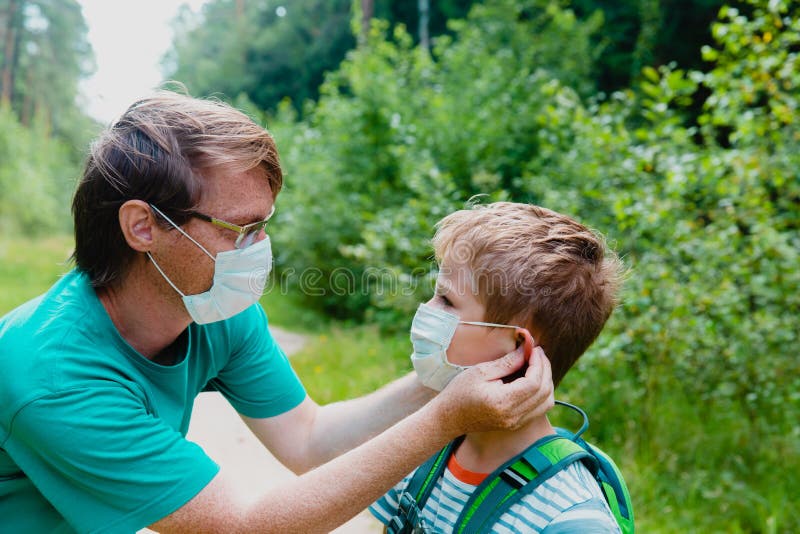 Father Put Mask on Son before Going To School Stock Photo - Image of ...