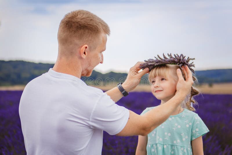 Father Puts a Lavender Wreath on His Daughter S Head Stock Image ...
