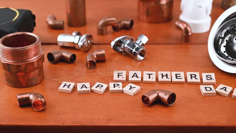 Father`s Day Concept Surrounded by Different Copper Water Pipe Stock ...
