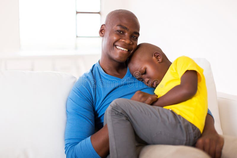 Father sitting couch son stock photo. Image of childhood - 63088548