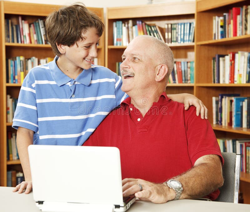 Father and Son Use Netbook Computer Stock Photo - Image of lifestyle ...