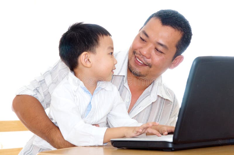 Father and Son on Computer Together Stock Image - Image of campus ...