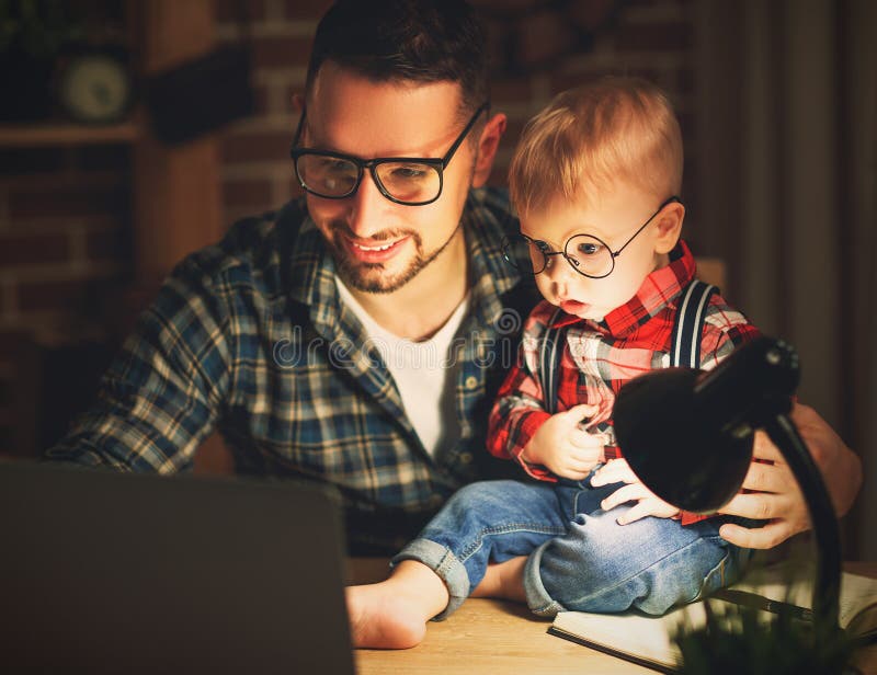 Father and Son Baby Work at Home at Computer in Dark Stock Image ...