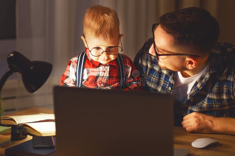 Father and Son Baby Work at Home at Computer in Dark Stock Image ...