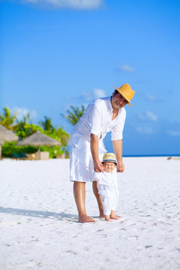 Father and Son on the Beach Stock Photo - Image of outdoor, exotic ...