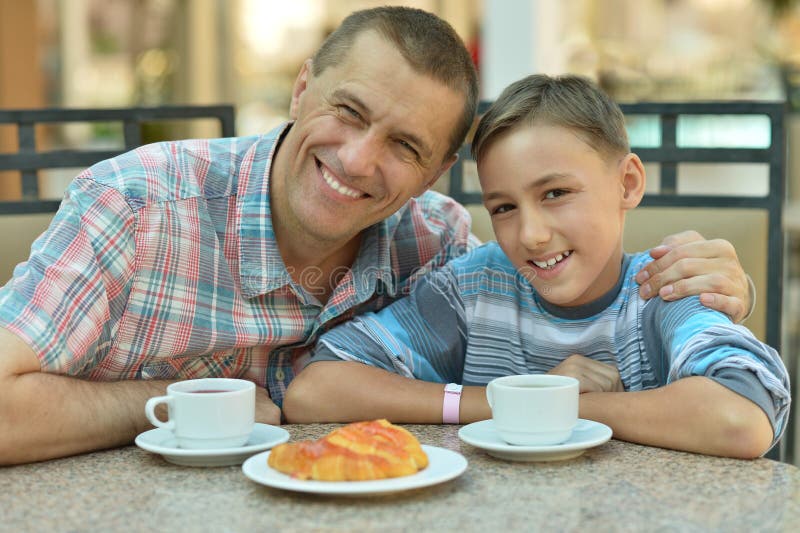 Father with Son at Breakfast Stock Image - Image of father, happy: 69968169