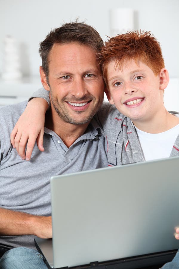 Father And Son Connected On Internet Picture. Image: 16289692