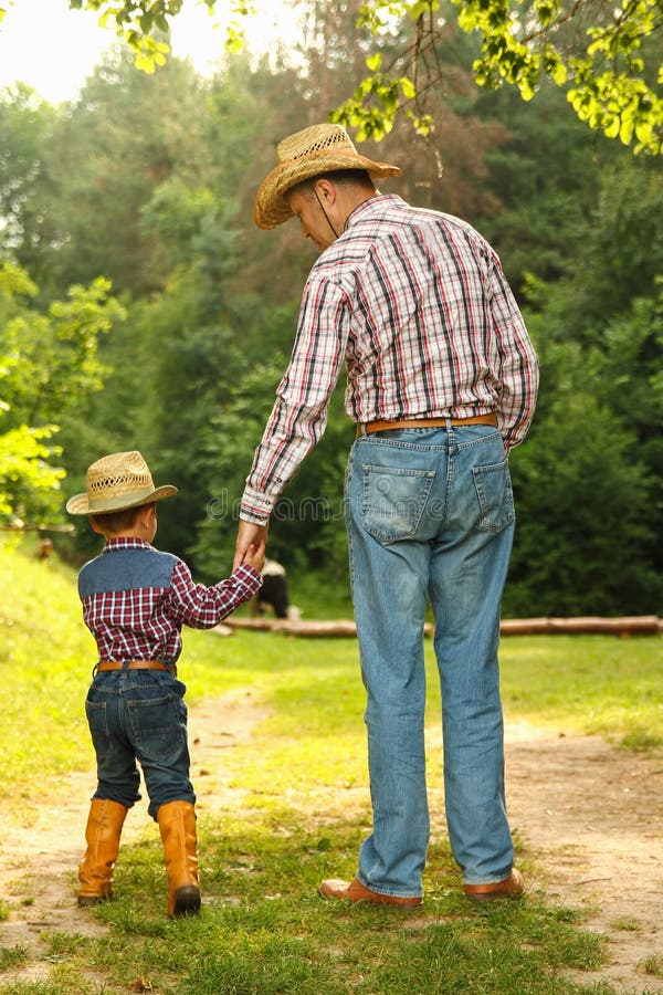 Father and Son Cowboys Concept Happiness Stock Photo - Image of luggage ...