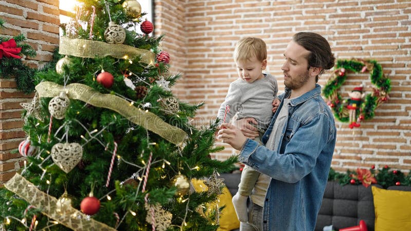 Father and Son Decorating Christmas Tree at Home Stock Photo - Image of ...