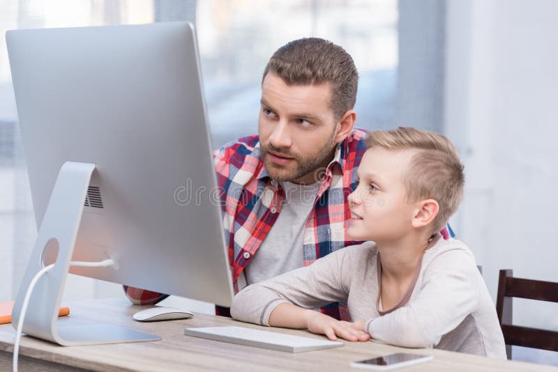 Father and Son with Desktop Computer Stock Image - Image of childhood ...