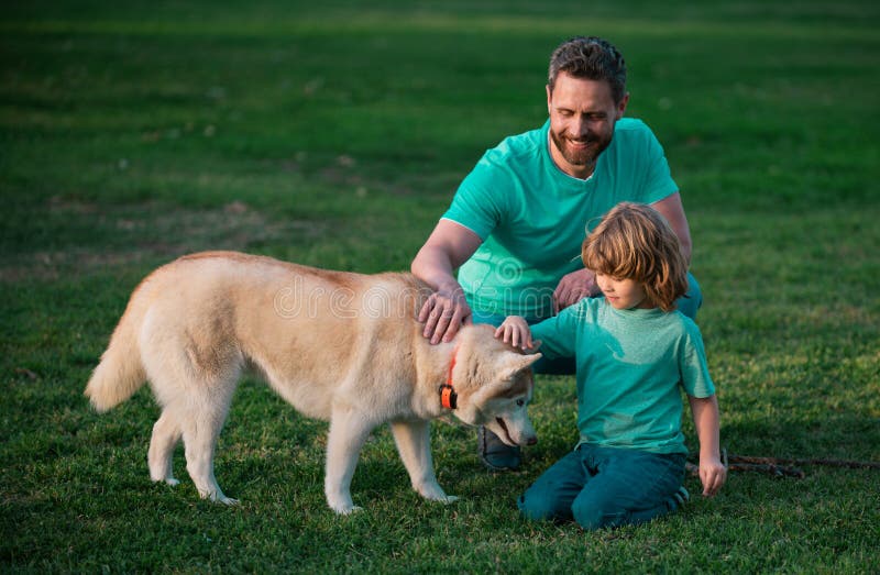 Father and Son with Dog Pet Outdoor. Stock Photo - Image of enjoy ...