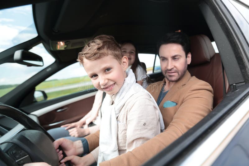 Father and Son Driving a Car Stock Image - Image of child, automobile ...