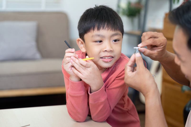 Activity of Father and Son Having Fun with DIY Learning Tools Stock ...