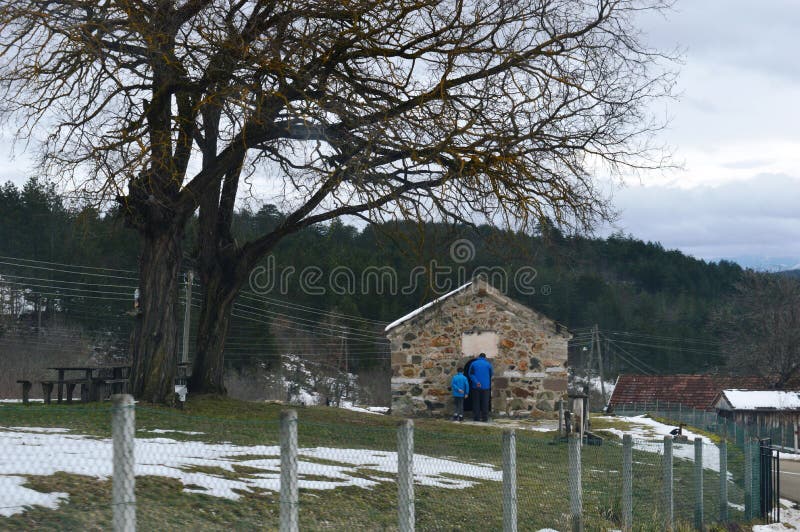 Father and Son Enter an Old Church Stock Photo - Image of people, snow ...