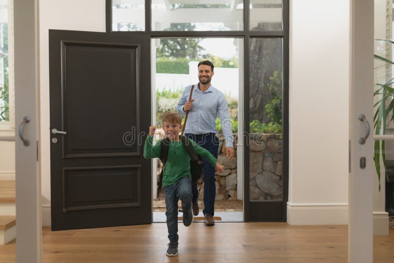 Family Entering Their House Stock Image - Image of black, house: 152086403