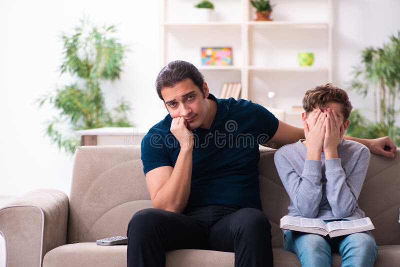 Father and Son in Exam Preparation Concept Stock Photo - Image of bored ...