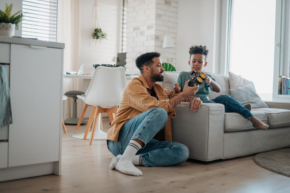 Father and Son Exploring STEM, Robotics, and Technology Together. Stock ...