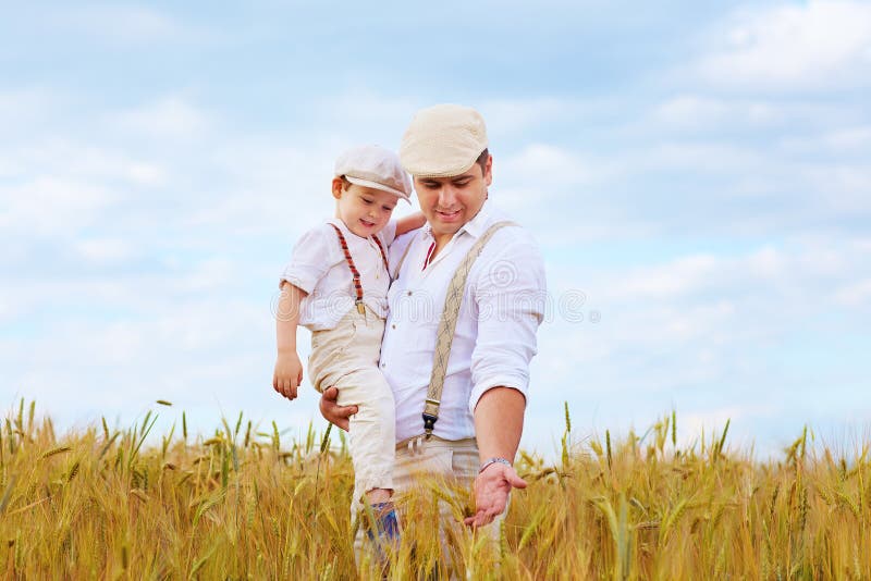 Father and Son, Farmers on Wheat Field Stock Photo - Image of happy ...