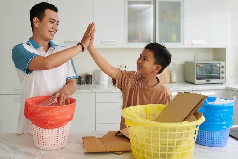 Sorting Waste as Game stock image. Image of teach, fatherhood - 320734709