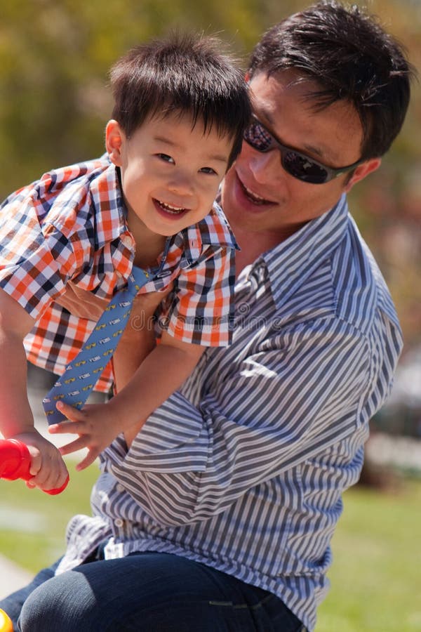 Father and son have fun stock image. Image of cheerful - 14267825