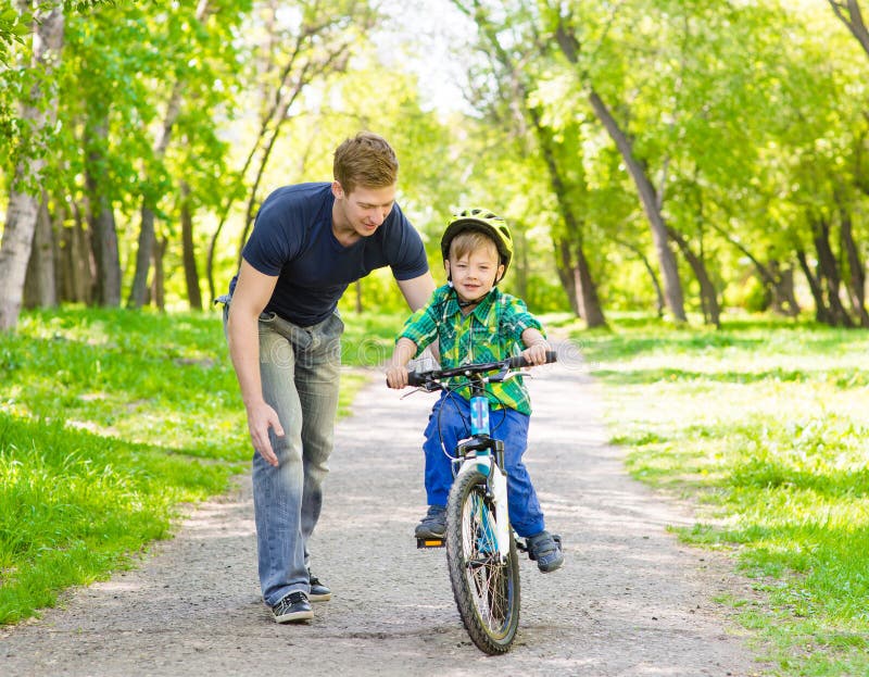 Father and Son Having Fun Weekend Biking Stock Image - Image of outdoor ...