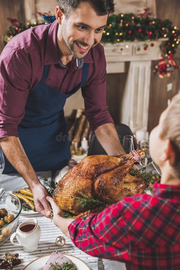 Father and Son Holding Roasted Turkey Stock Image - Image of food ...