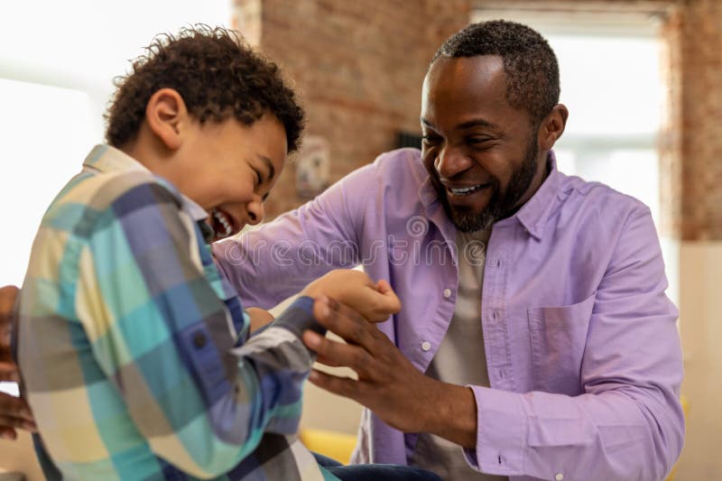 Father and Son at Home Getting Dressed in the Kitchen and Looking ...