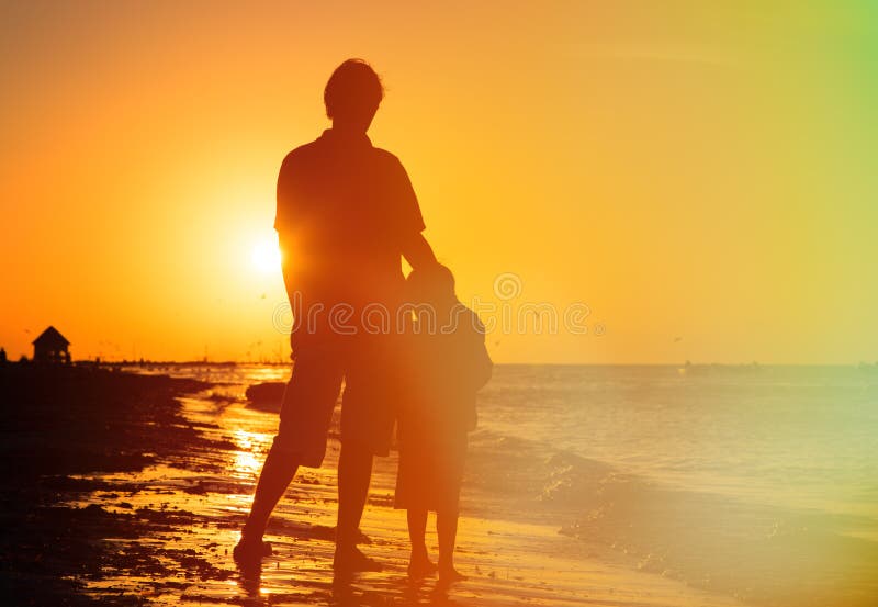 Father and Son Hug at Sunset Stock Photo - Image of leisure, people ...