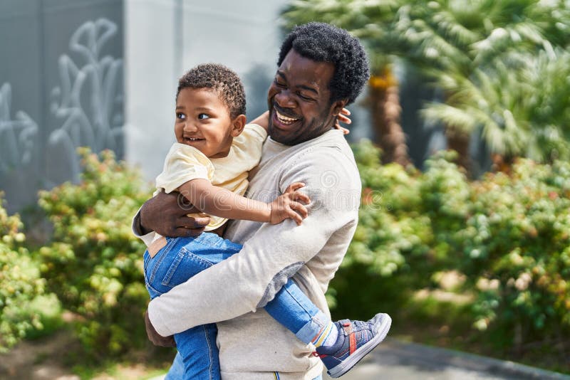 Father and Son Hugging Each Other at Playground Stock Image - Image of ...