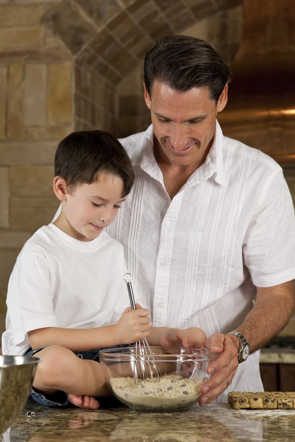 Father and Son in Kitchen Cooking Baking Cookies Stock Image - Image of ...
