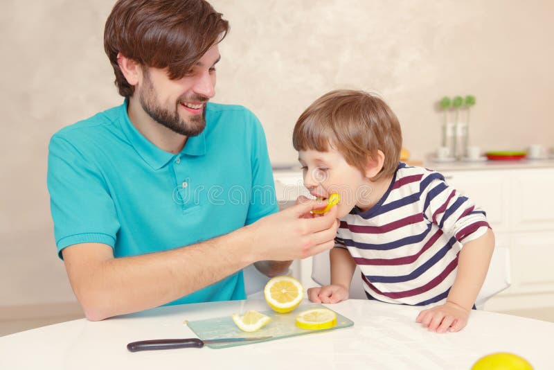 Father and Son Make Lemonade Stock Image - Image of love, caucasians ...