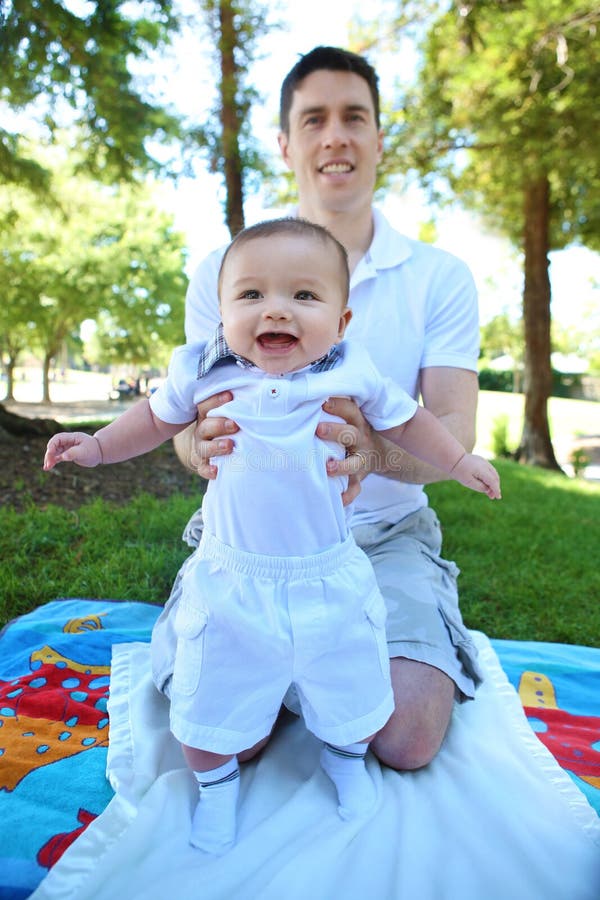 Father Holding Young Son stock image. Image of youth - 19185211