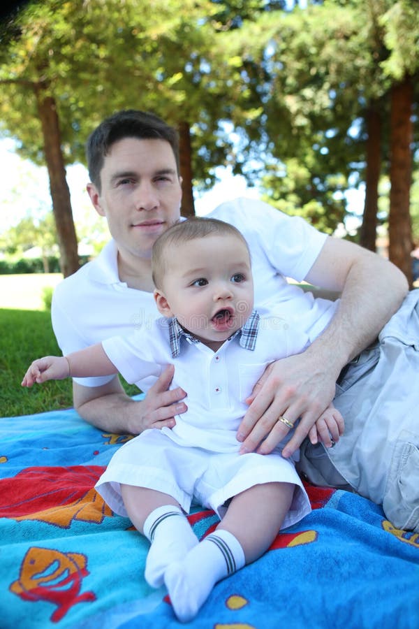 Father Holding Young Son stock image. Image of youth - 19185211