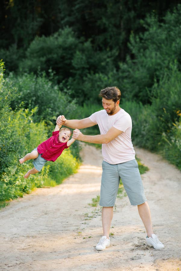 Father and Son Play Together in the Park and Have Fun Stock Image ...